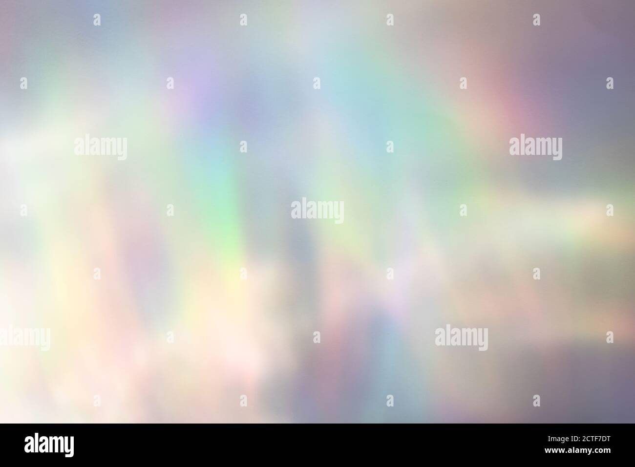 Blurred rainbow light refraction texture on white wall Stock Photo - Alamy