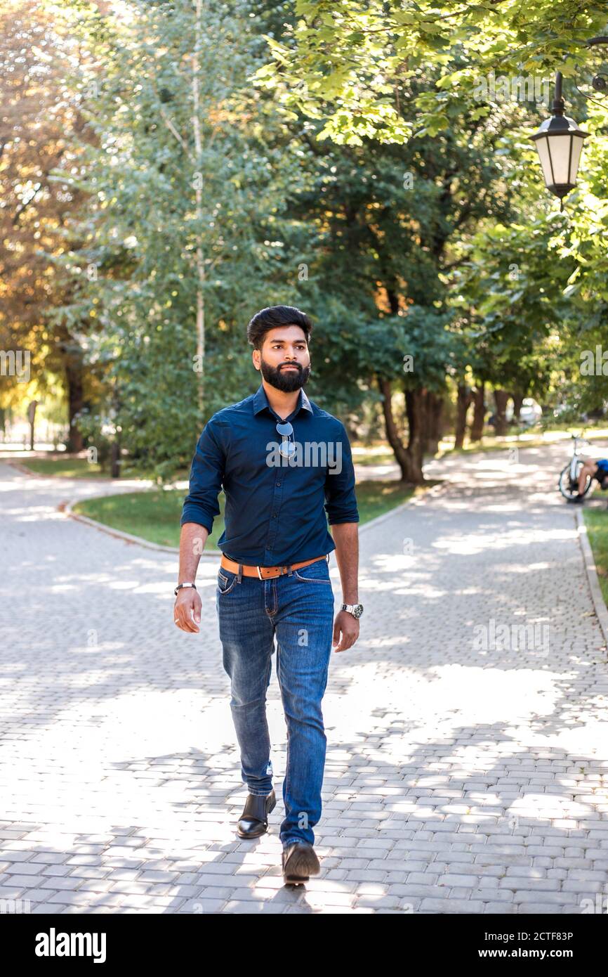 Handsome young man walking restaurant hi-res stock photography and ...
