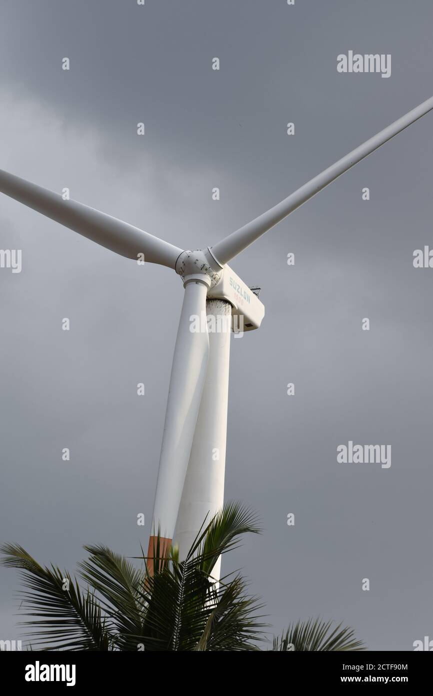 windmill with dark cloud image Stock Photo - Alamy