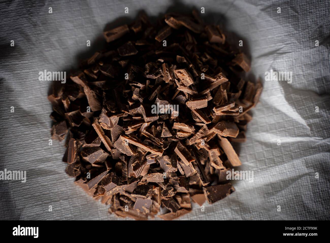 Chopped chocolate with low light Stock Photo - Alamy