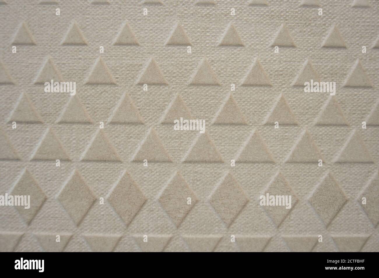 Beige wallpaper texture with triangle shapes Stock Photo - Alamy