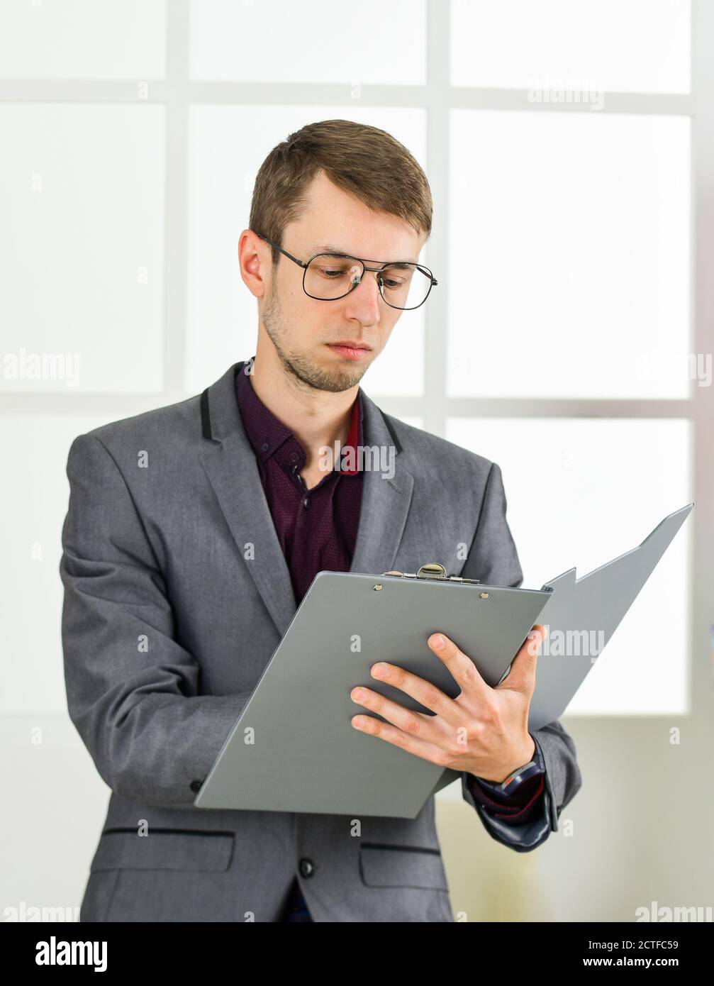 Man in jacket folder successful manager work with documents, strict ...