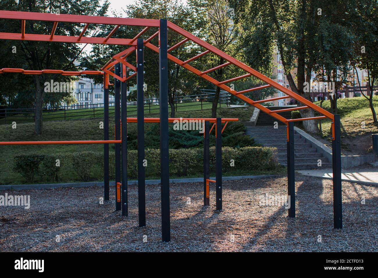 sports ground with exercise equipment in park Stock Photo - Alamy