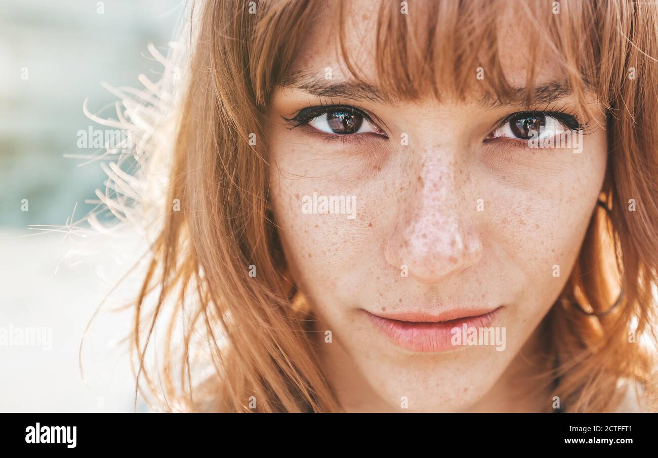 Portrait of a beautiful redhead woman outdoor - Strong and successful ...