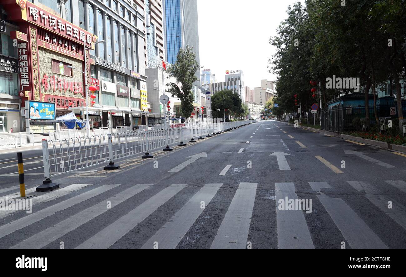An empty street is pictured in Urumqi city, northwest China's Xinjiang ...
