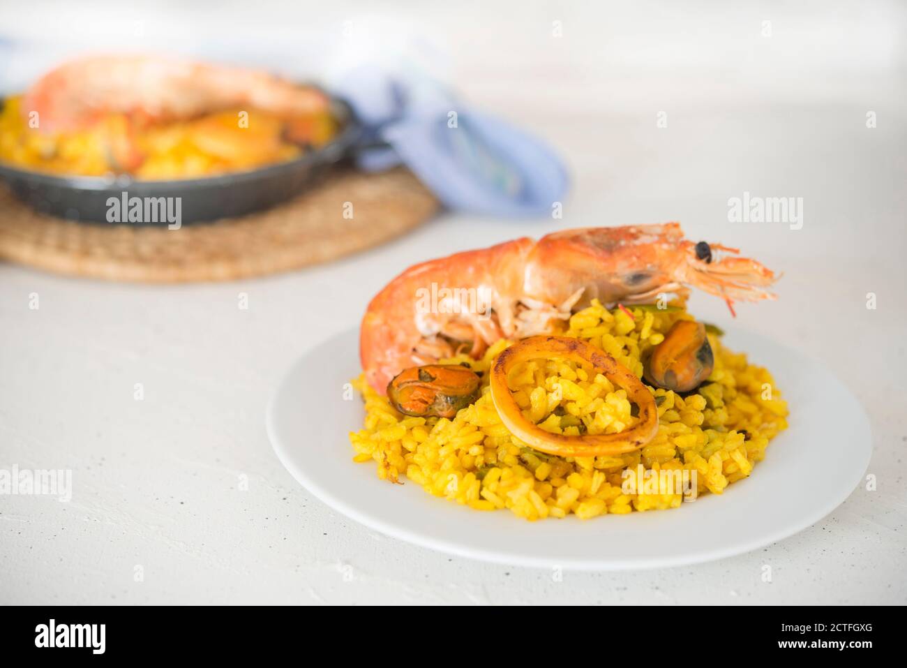 Paella typical spanish food in granite background Stock Photo - Alamy