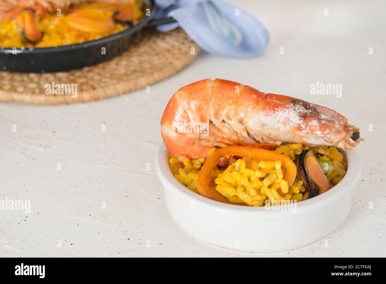 Paella typical spanish food in granite background Stock Photo - Alamy