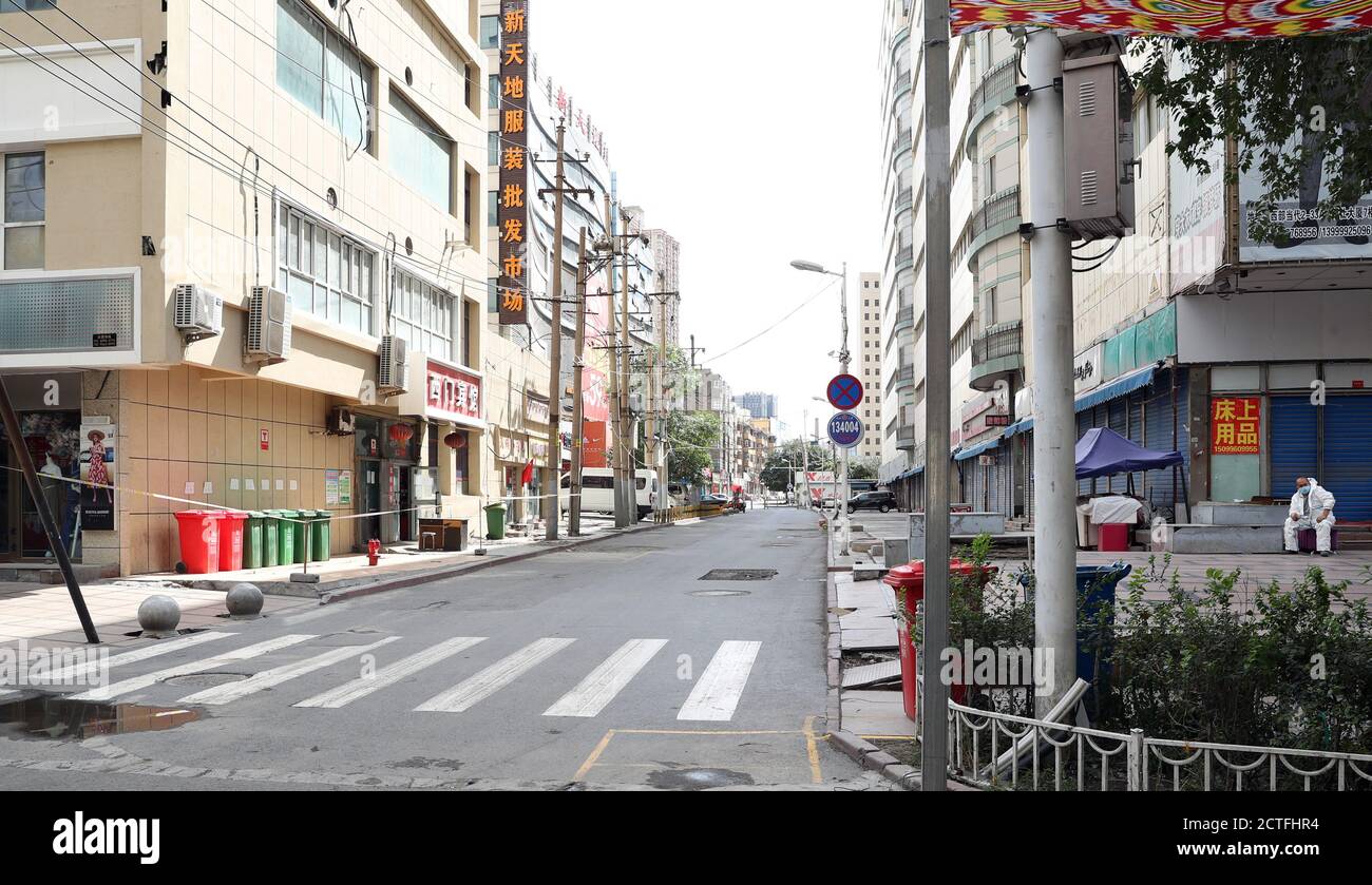 An empty street is pictured in Urumqi city, northwest China's Xinjiang ...