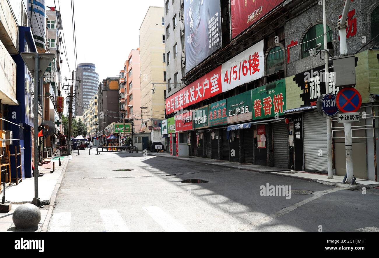 An empty street is pictured in Urumqi city, northwest China's Xinjiang ...