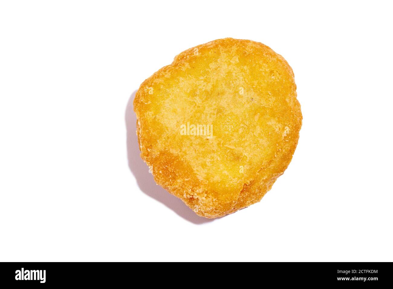 Macro image of chicken nugget isolated on white background. Fast junk ...