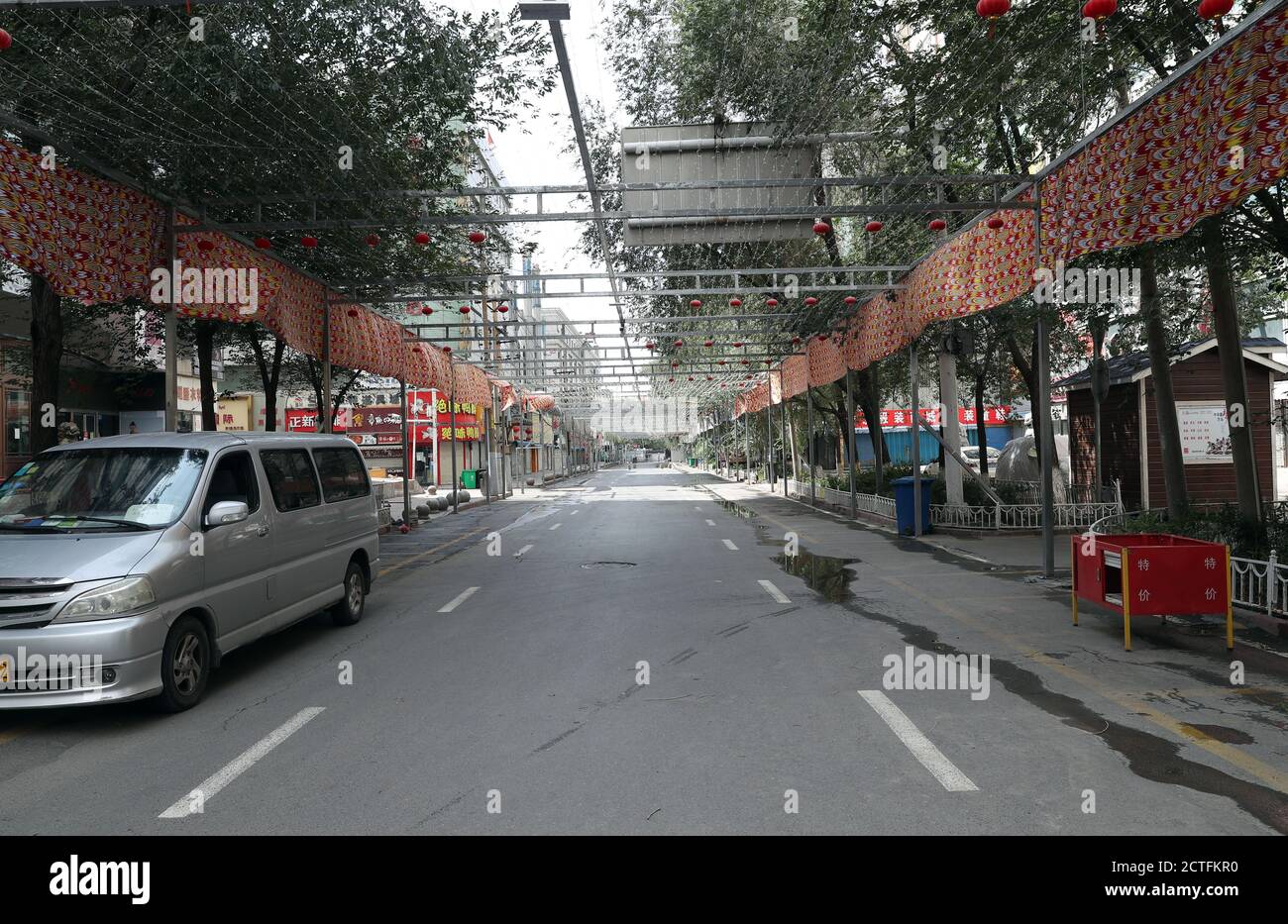 An empty street is pictured in Urumqi city, northwest China's Xinjiang ...