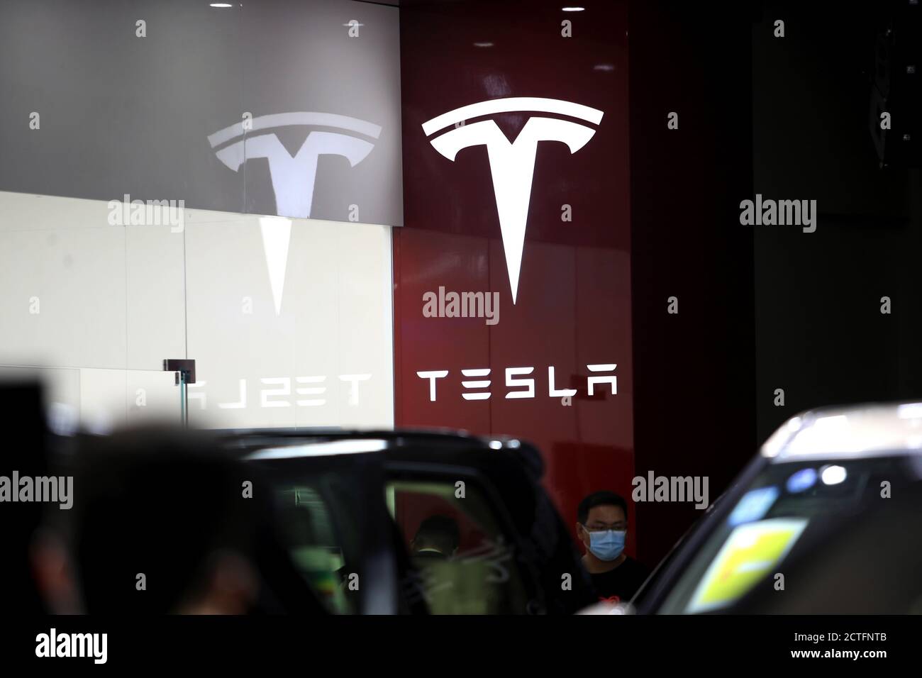 The logo of Tesla, an American electric vehicle and clean energy ...