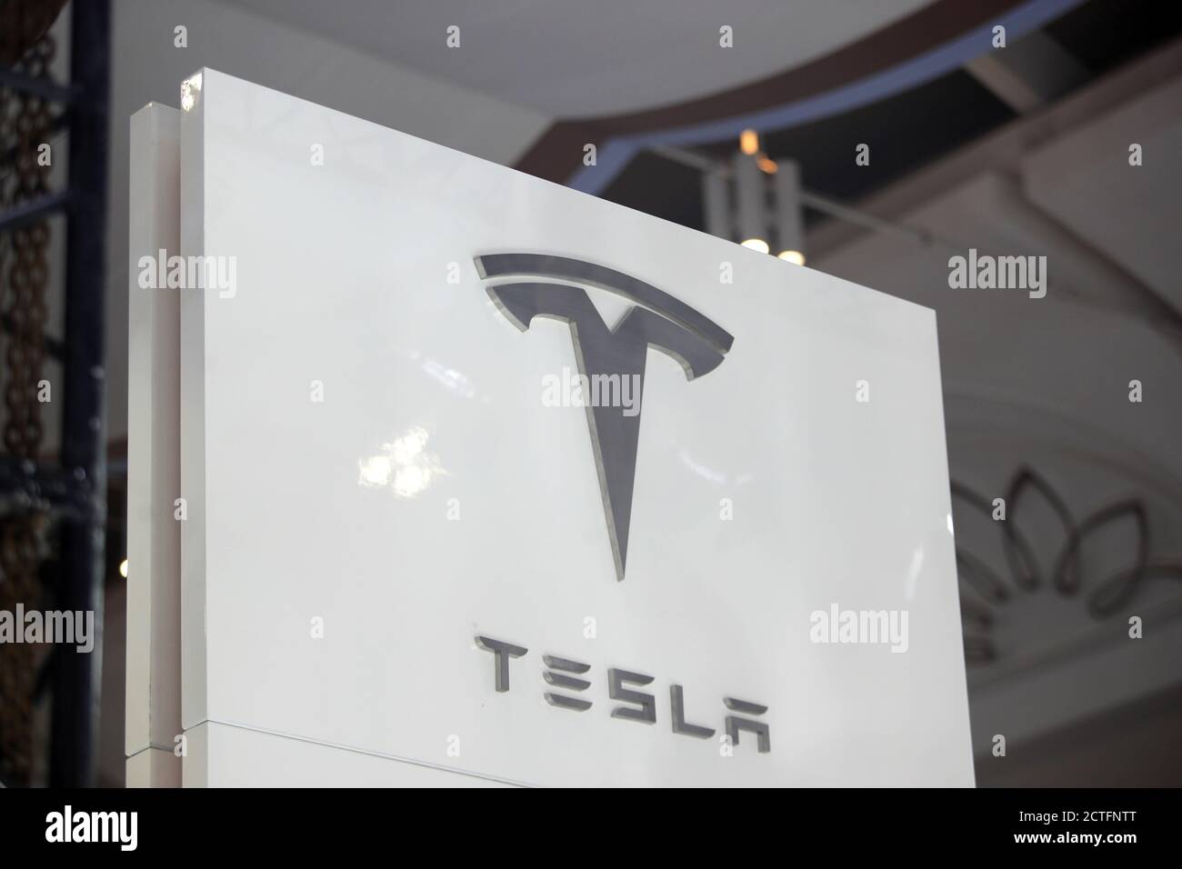 The logo of Tesla, an American electric vehicle and clean energy ...