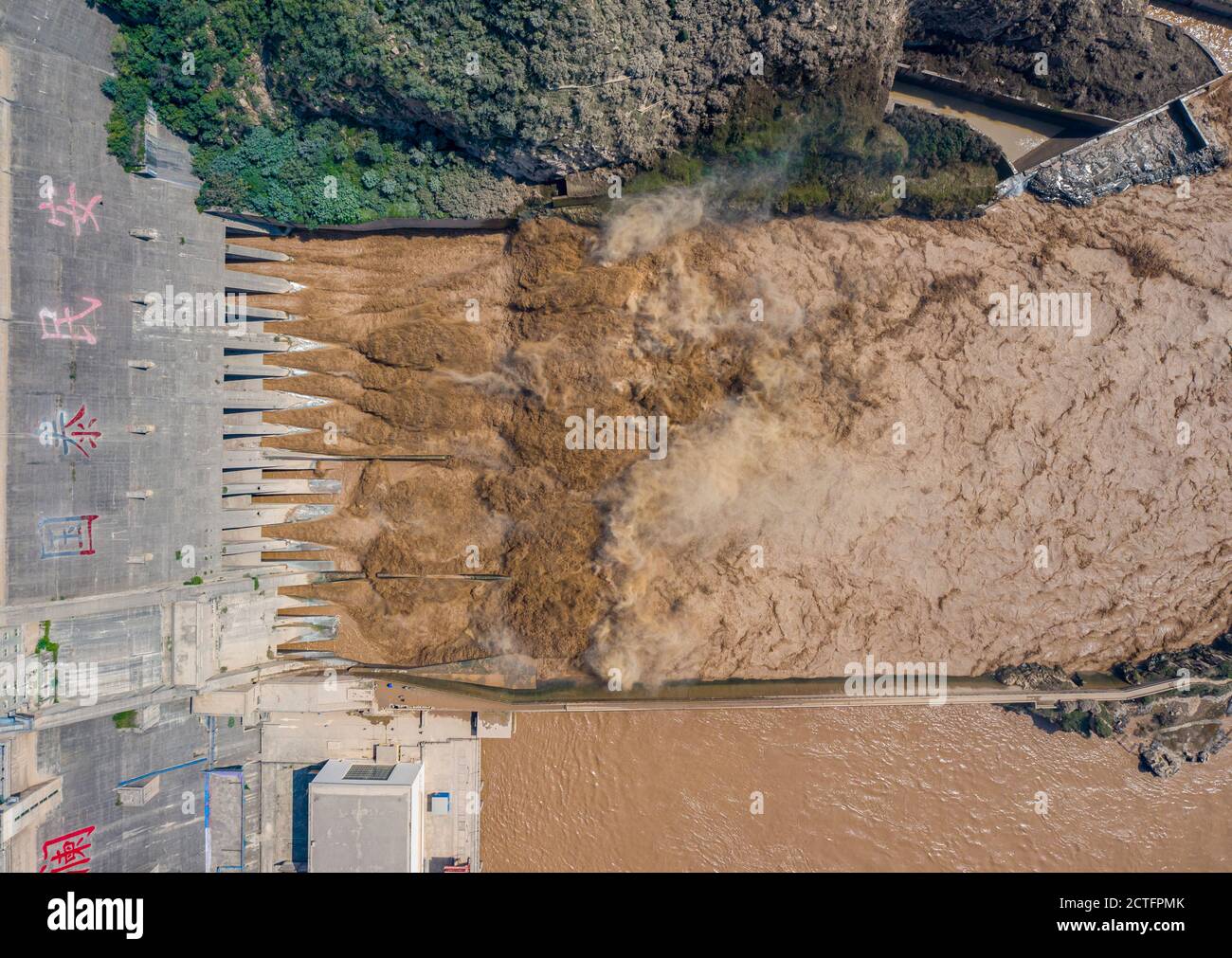 Aerial view of Sanmenxia Dam discharging water due to the flood peak at ...