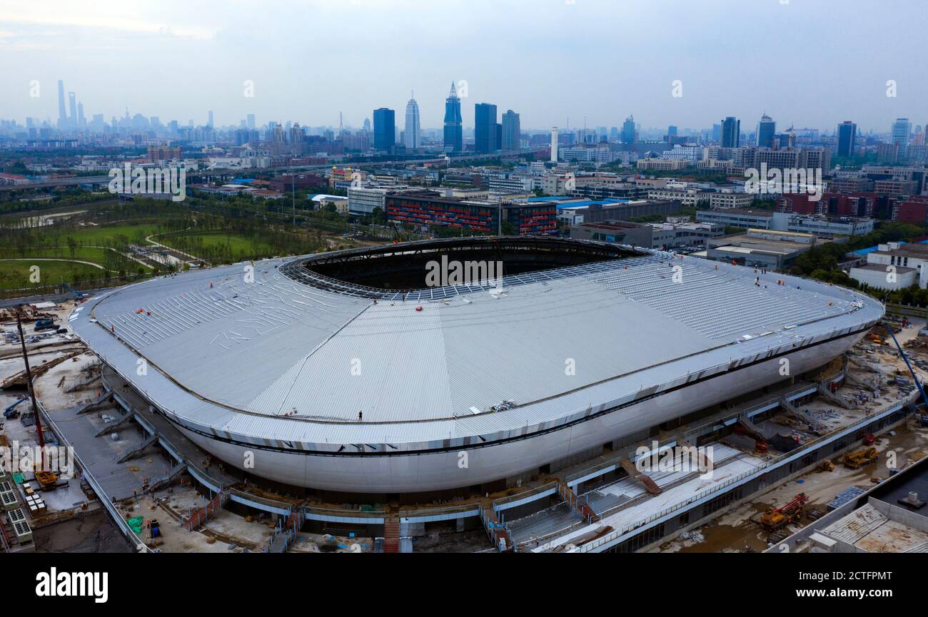 An aerial view of the Pudong Football Stadium under construction ...