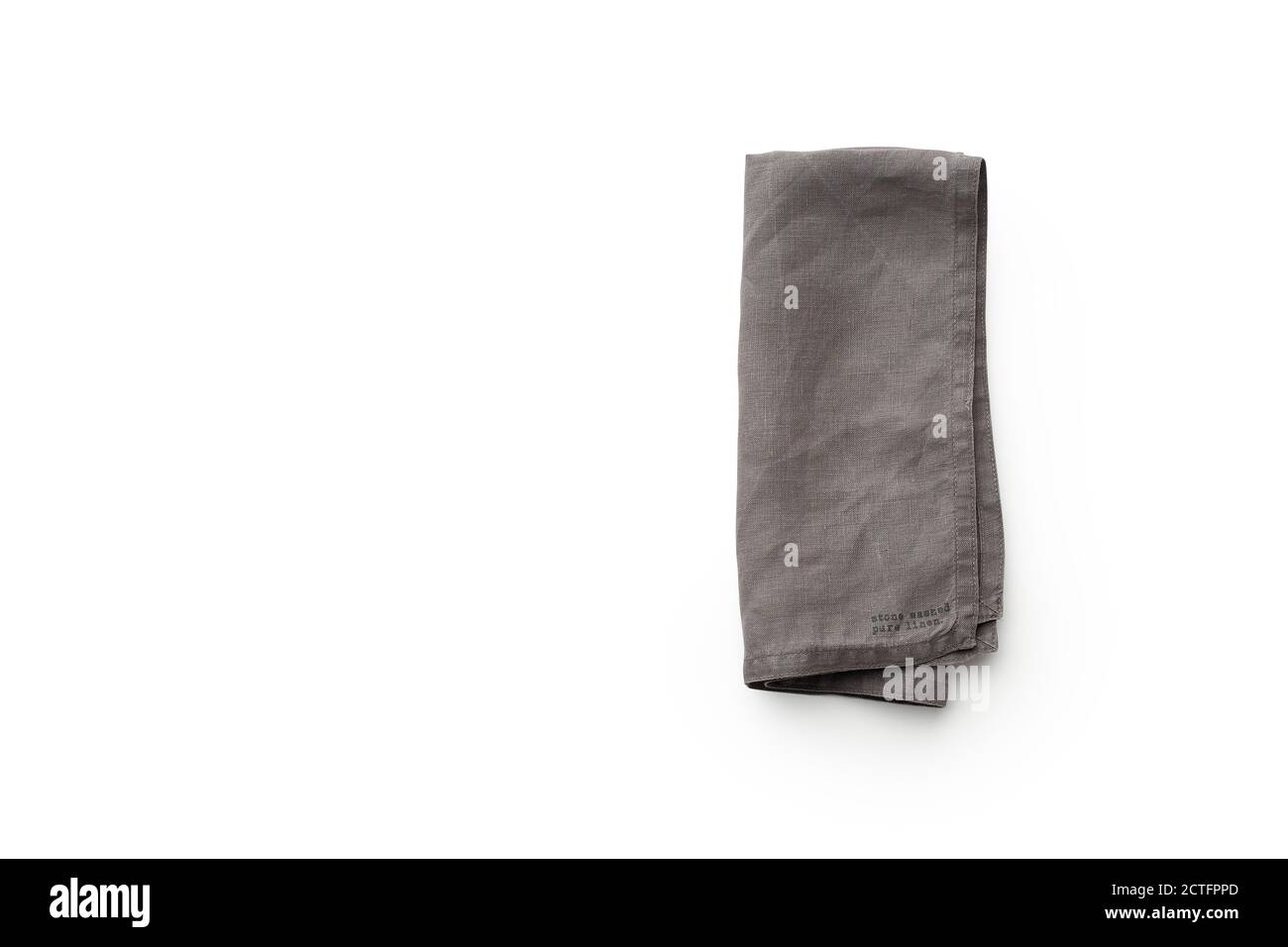 Flat lay with gray linen kitchen napkin isolated on white background ...