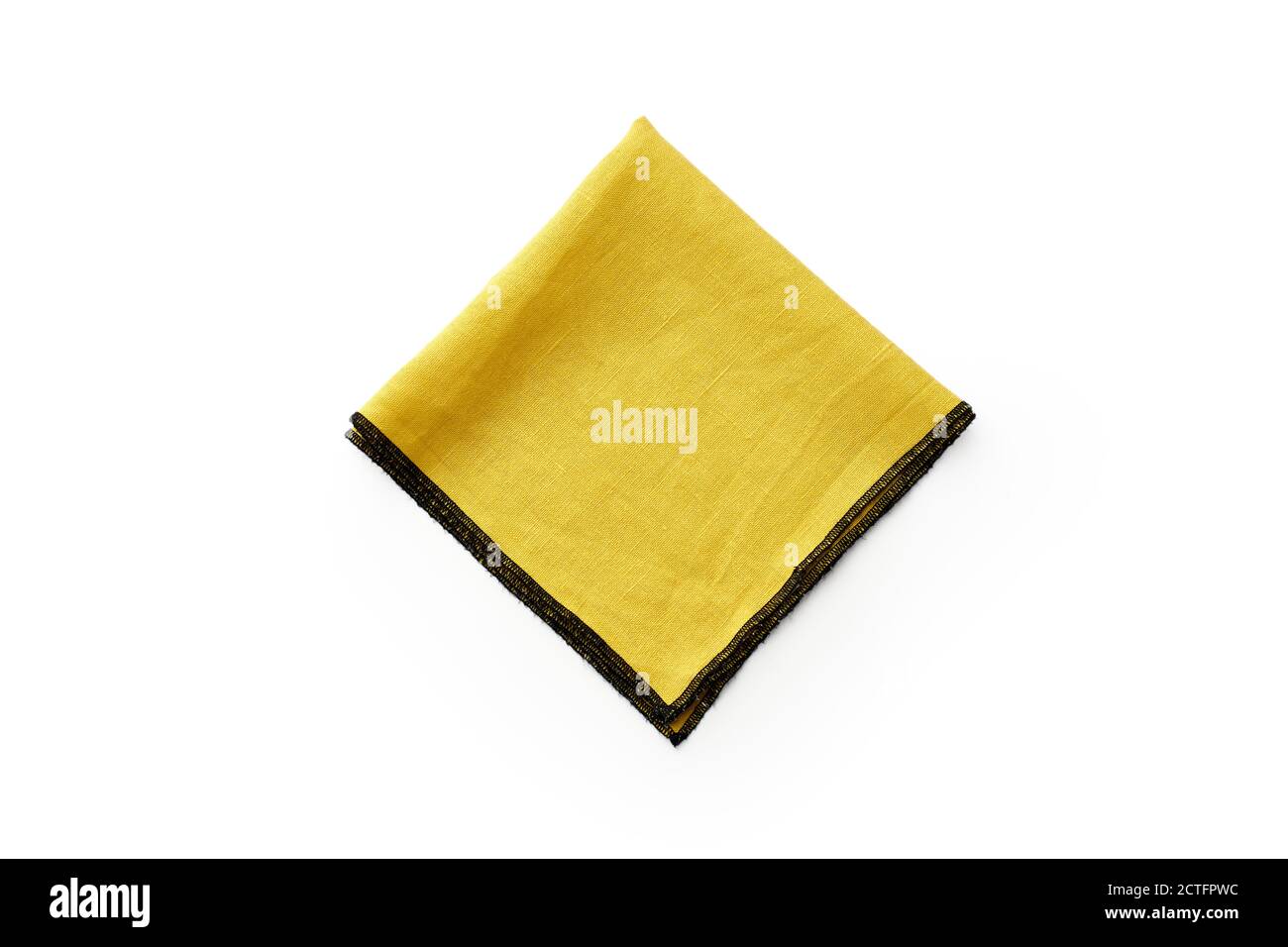 Flat lay with yellow linen kitchen napkin isolated on white background ...