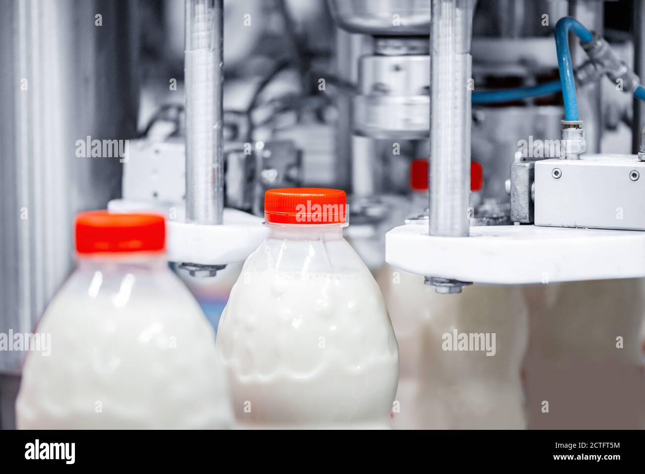Machine for bottling milk, industry equipment dairy plant Stock Photo ...