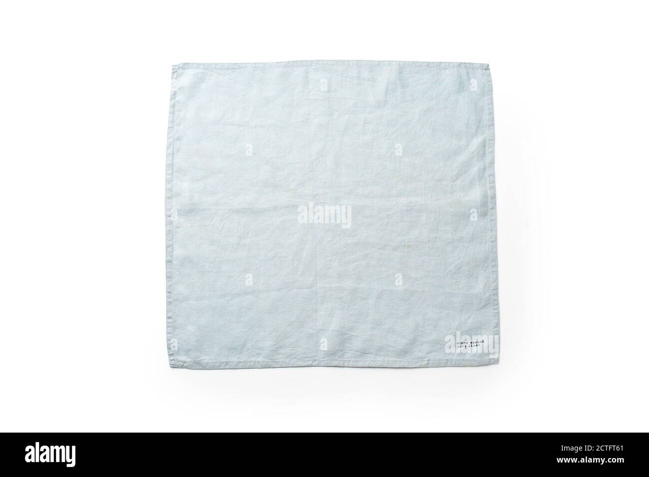 Flat lay with blue linen rustic kitchen napkin isolated on white ...