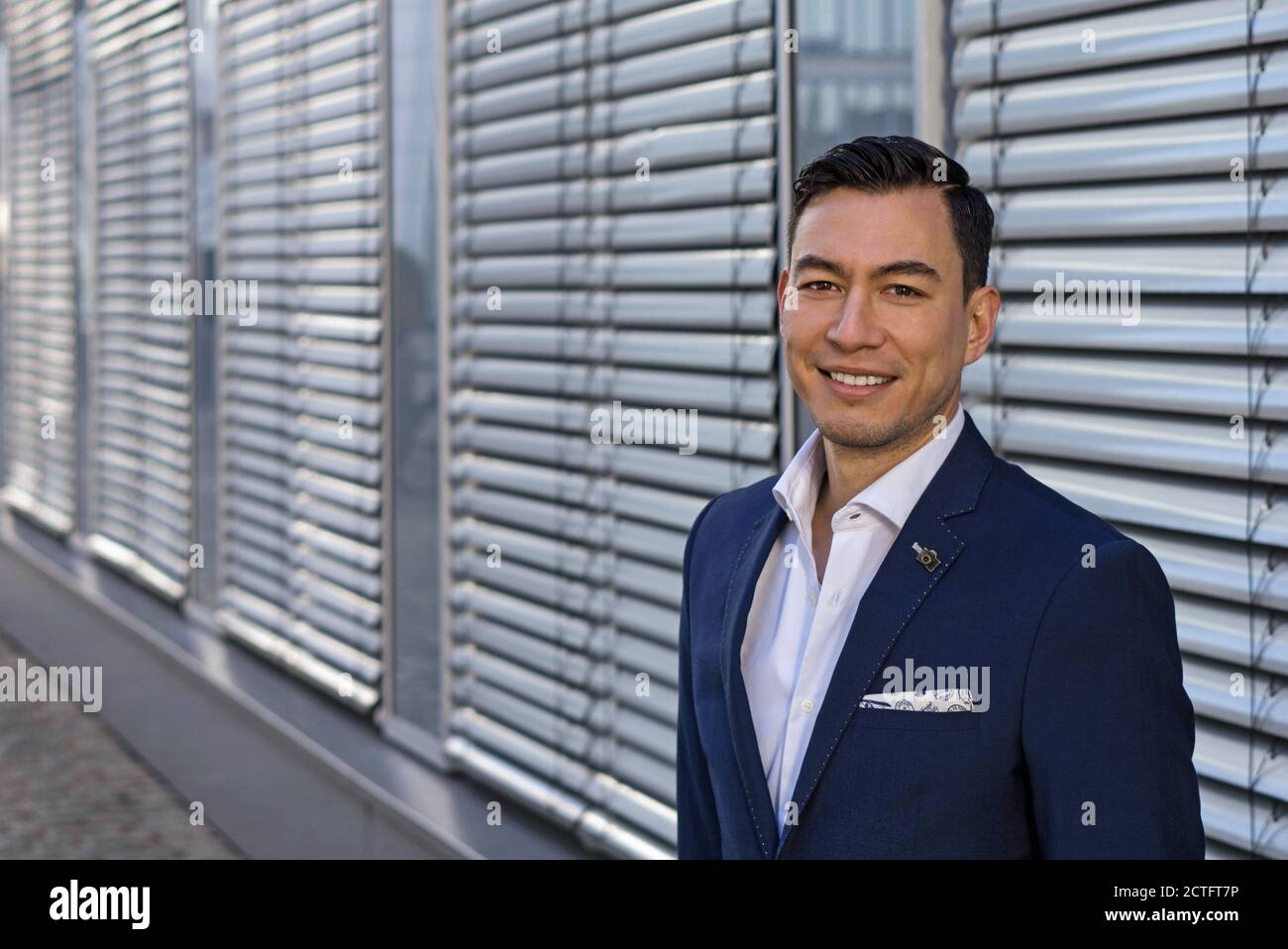 German businessman looking at camera hi-res stock photography and ...