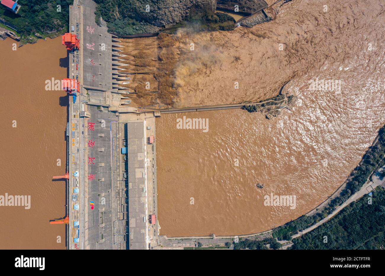 Aerial view of Sanmenxia Dam discharging water due to the flood peak at ...