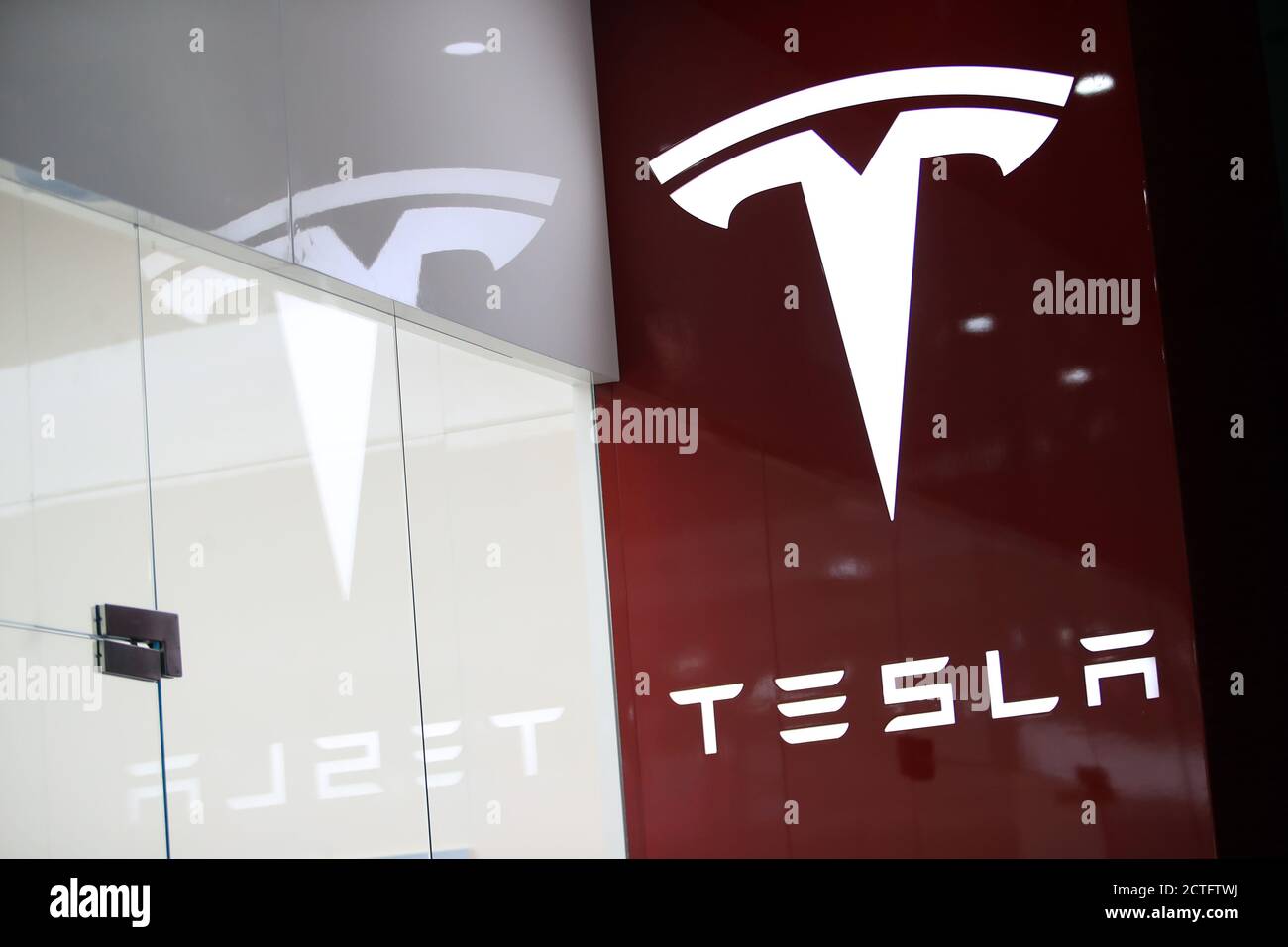 The logo of Tesla, an American electric vehicle and clean energy ...