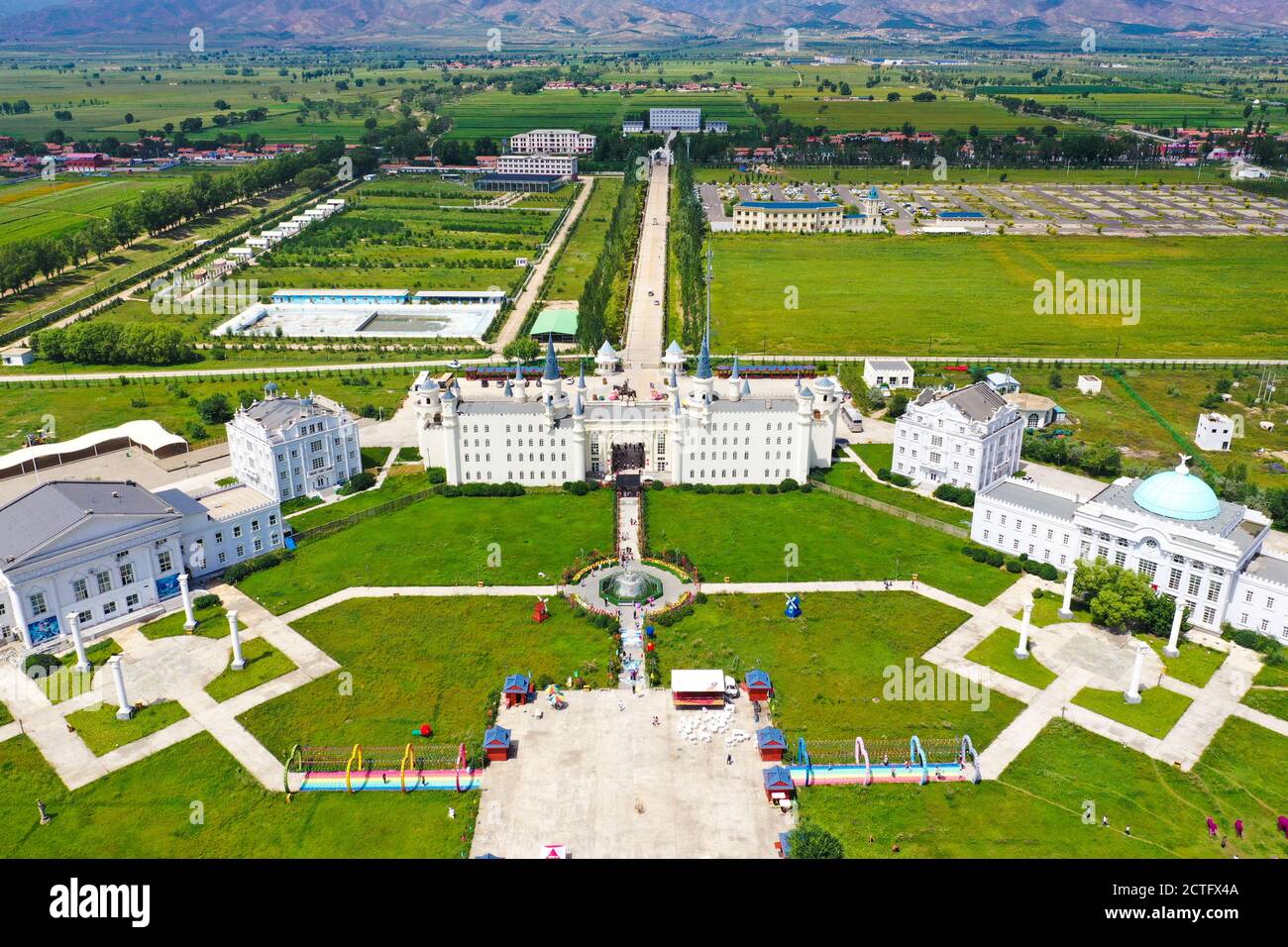 Aerial view of a European style castle by Lake Dai in Ulanqab city ...
