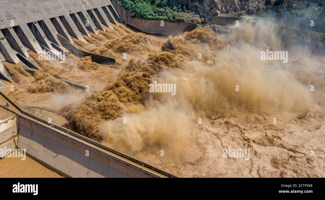 Aerial view of Sanmenxia Dam discharging water due to the flood peak at ...