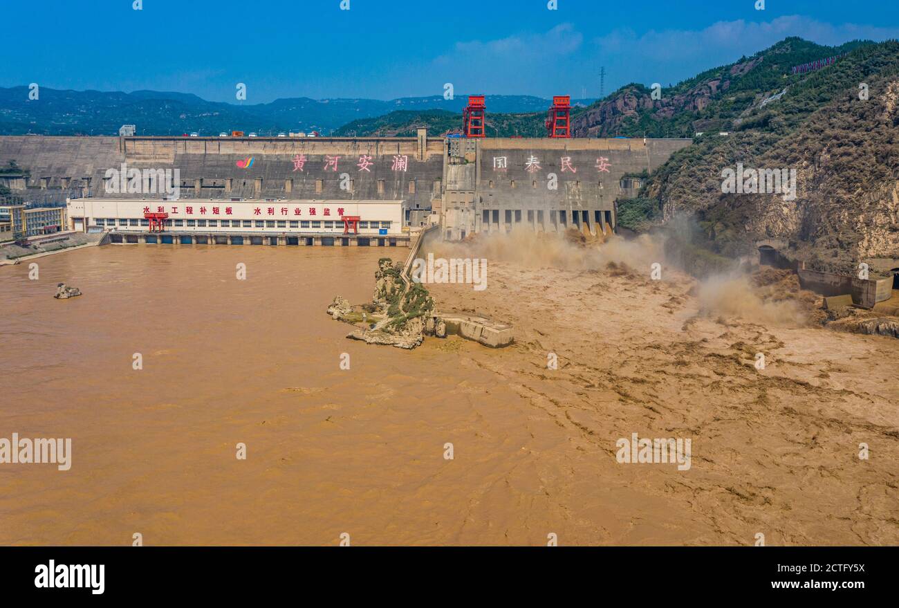 Aerial view of Sanmenxia Dam discharging water due to the flood peak at ...