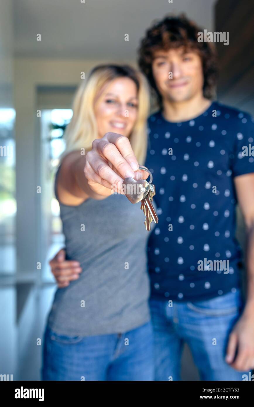 Happy girl keys hi-res stock photography and images - Alamy