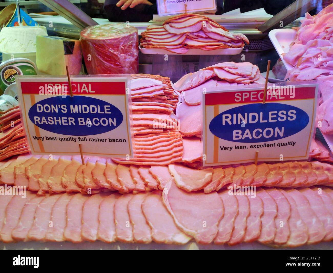 VARIOUS TYPES OF BACON ON DISPLAY INSIDE OF THE QUEEN VICTORIA MARKET ...