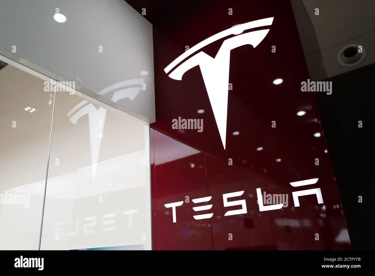 The logo of Tesla, an American electric vehicle and clean energy ...