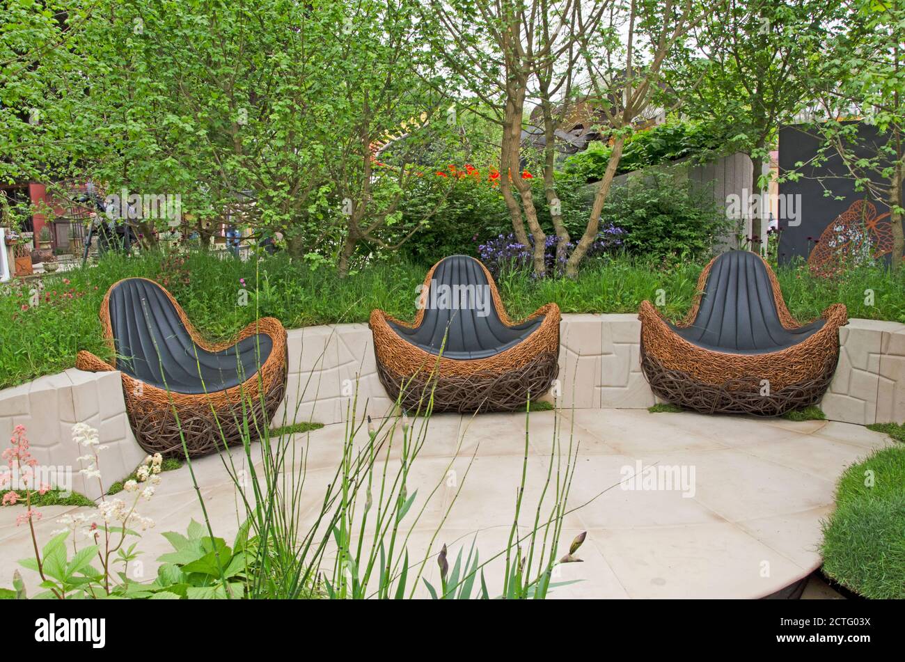 SHOW GARDEN WITH DESIGNED SEATING. LONDON. MAY Contemporary designed ...
