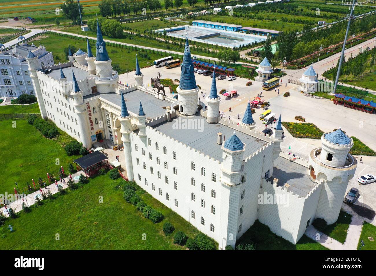 Aerial view of a European style castle by Lake Dai in Ulanqab city ...