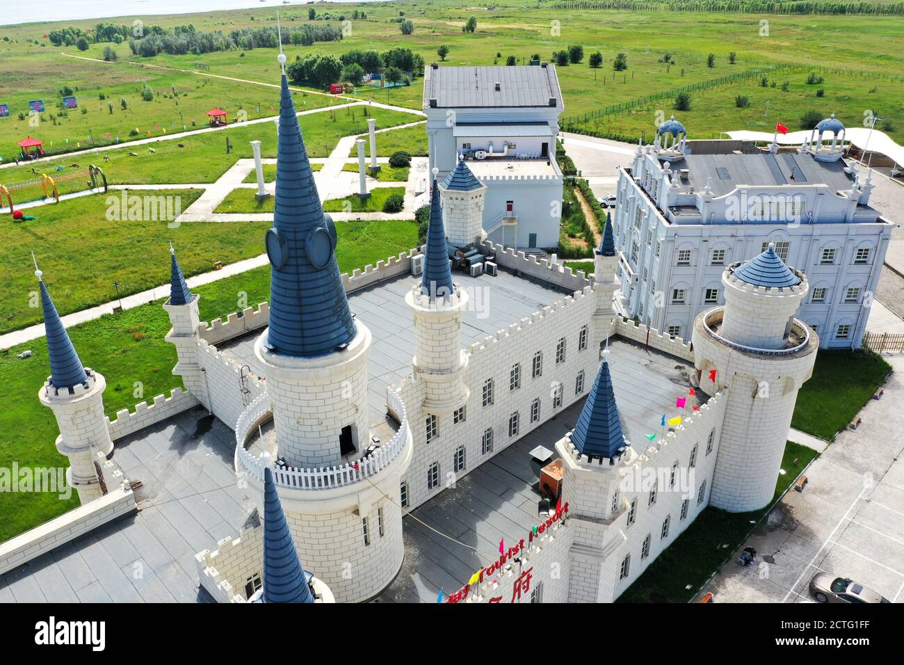 Aerial view of a European style castle by Lake Dai in Ulanqab city ...