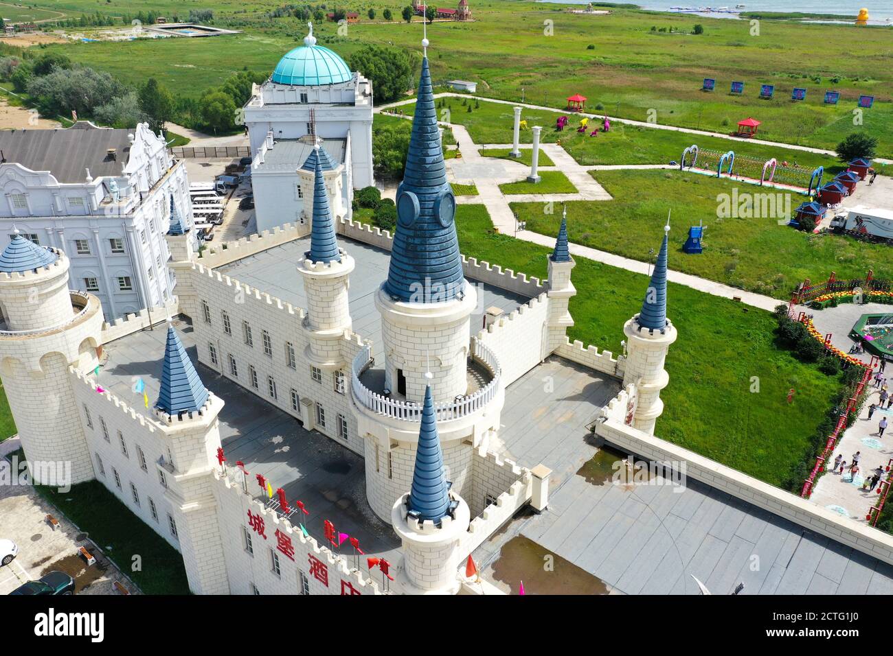 Aerial view of a European style castle by Lake Dai in Ulanqab city ...