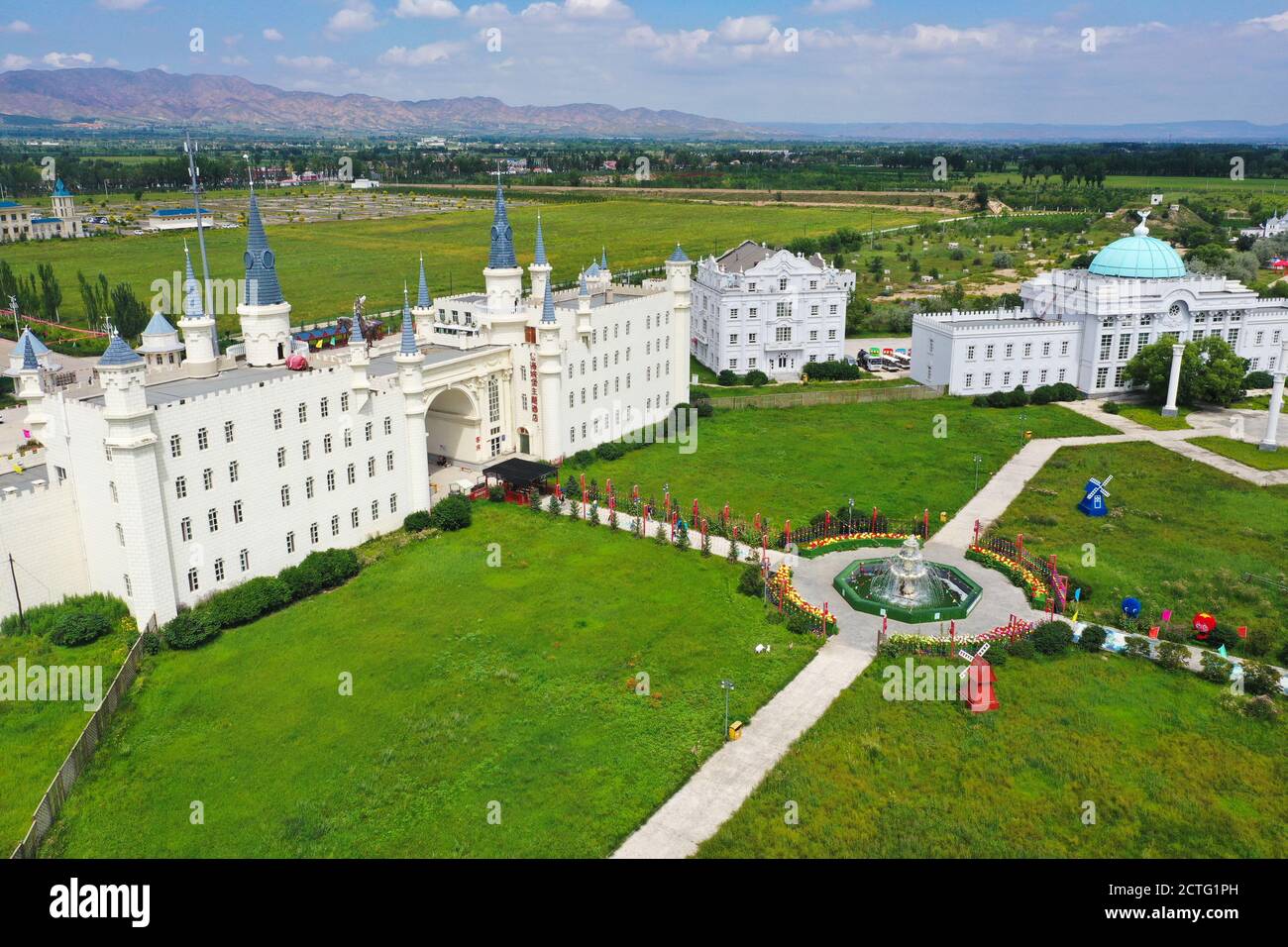 Aerial view of a European style castle by Lake Dai in Ulanqab city ...