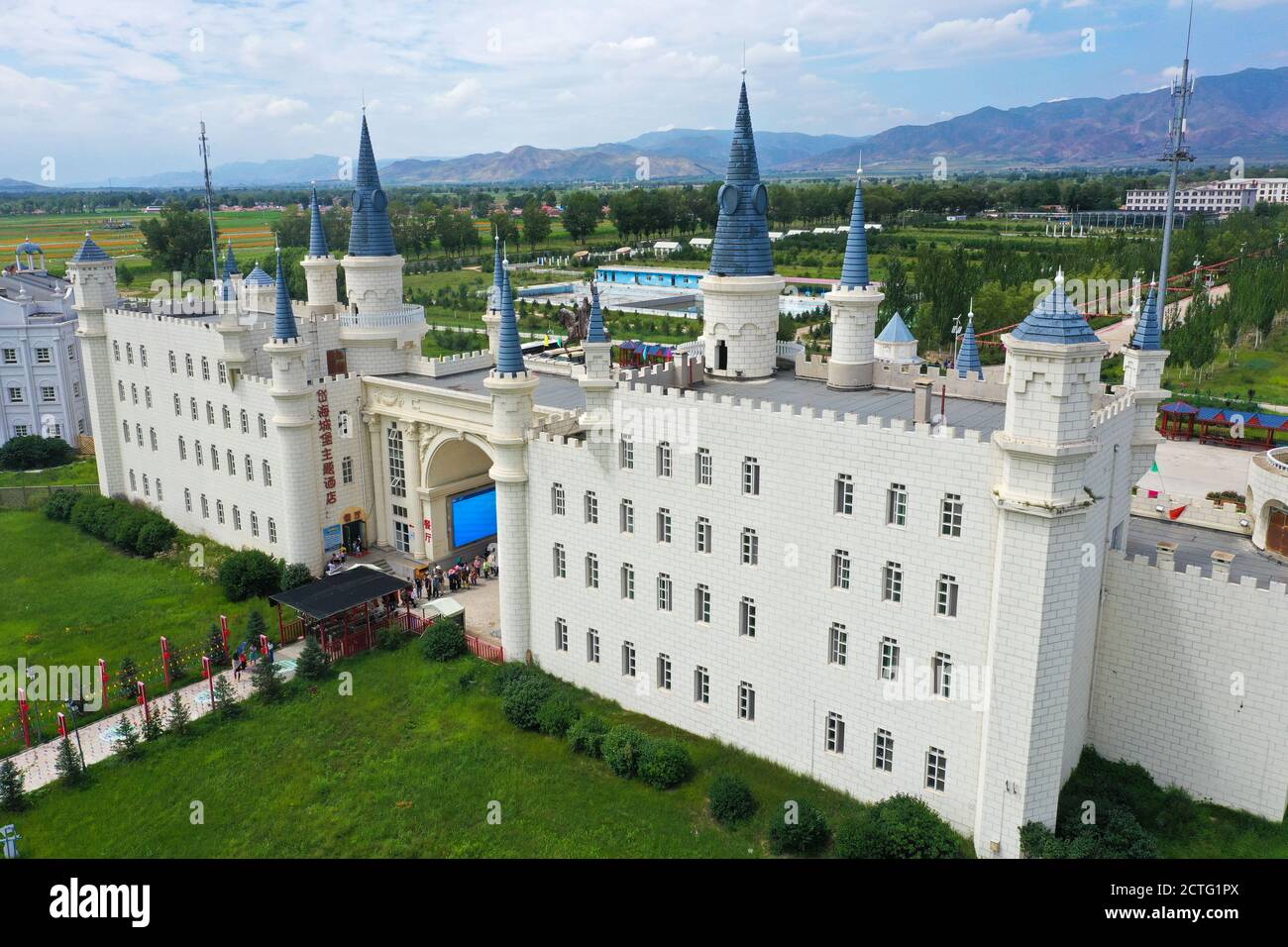 Aerial view of a European style castle by Lake Dai in Ulanqab city ...