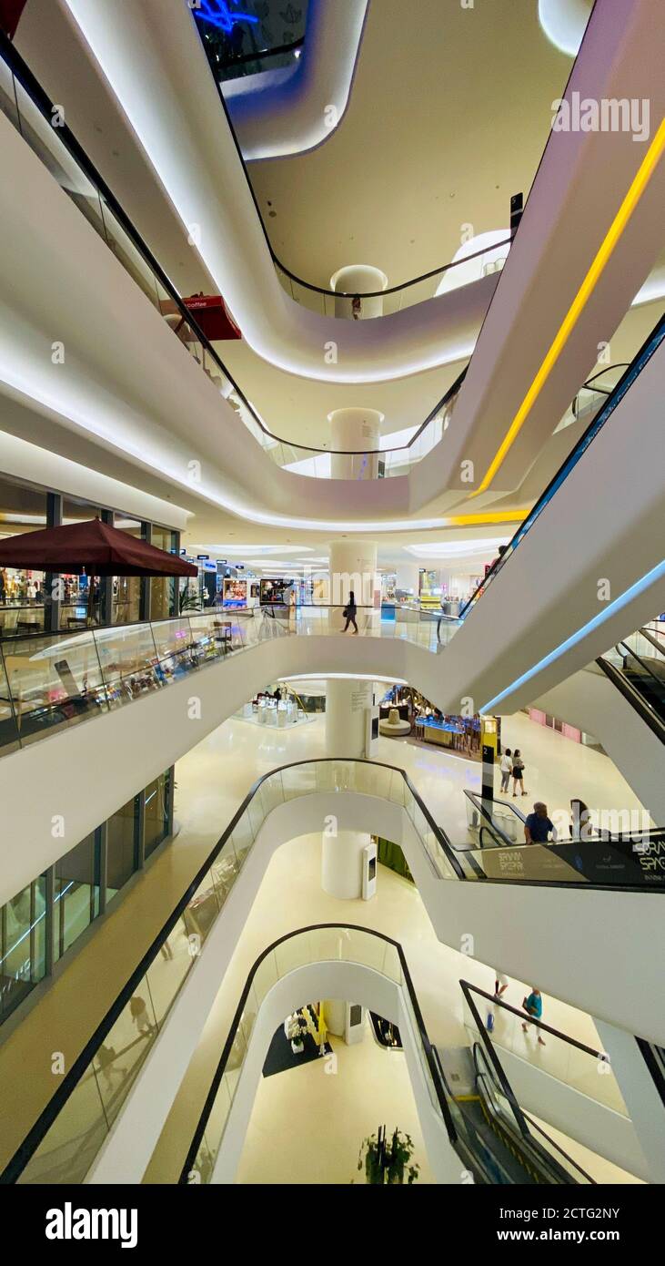 Multil level shopping mall with shoppers Stock Photo - Alamy