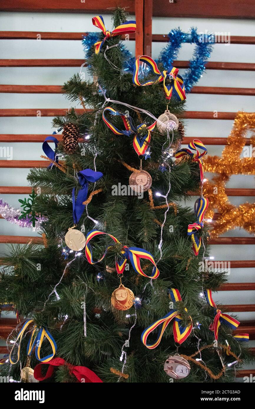 Christmas Tree made with medals as decoration Stock Photo - Alamy