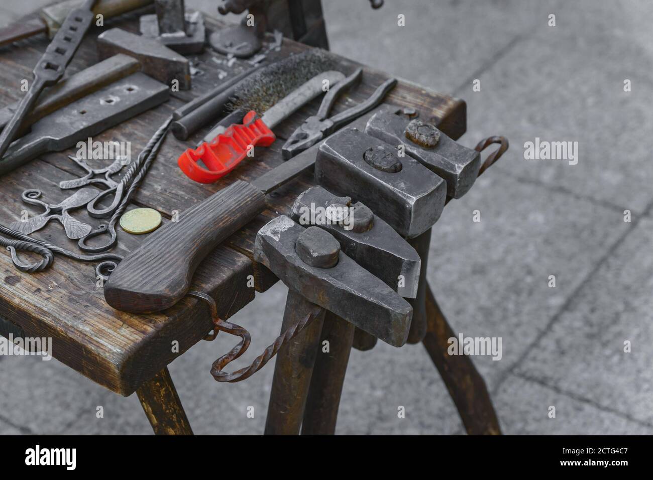 blacksmith tools and workplace: anvil, hammers, blacksmith tongs ...