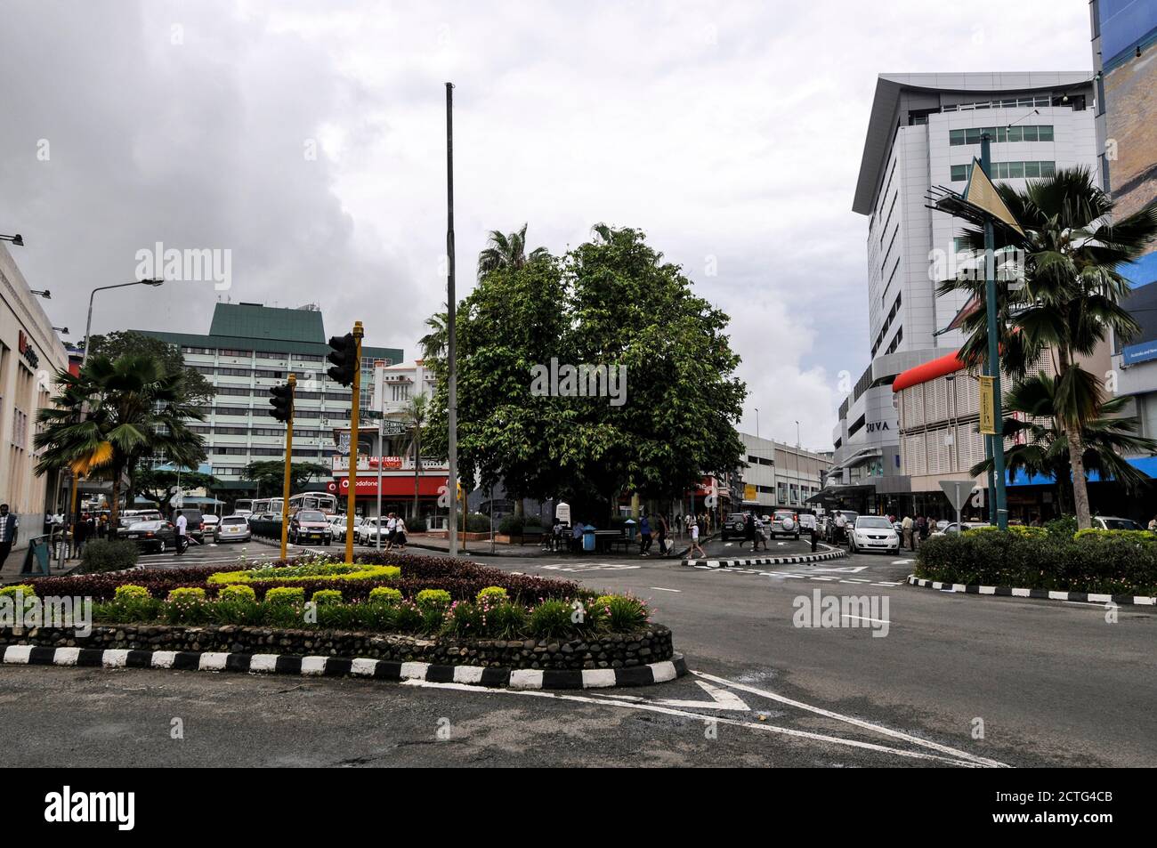 Busy road junction in the centre of the capital city of Suva in Viti ...
