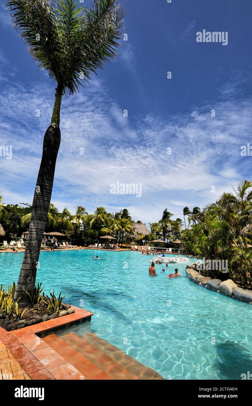 A large swimming pool at the Outriggers on the Lagoon hotel complex in ...
