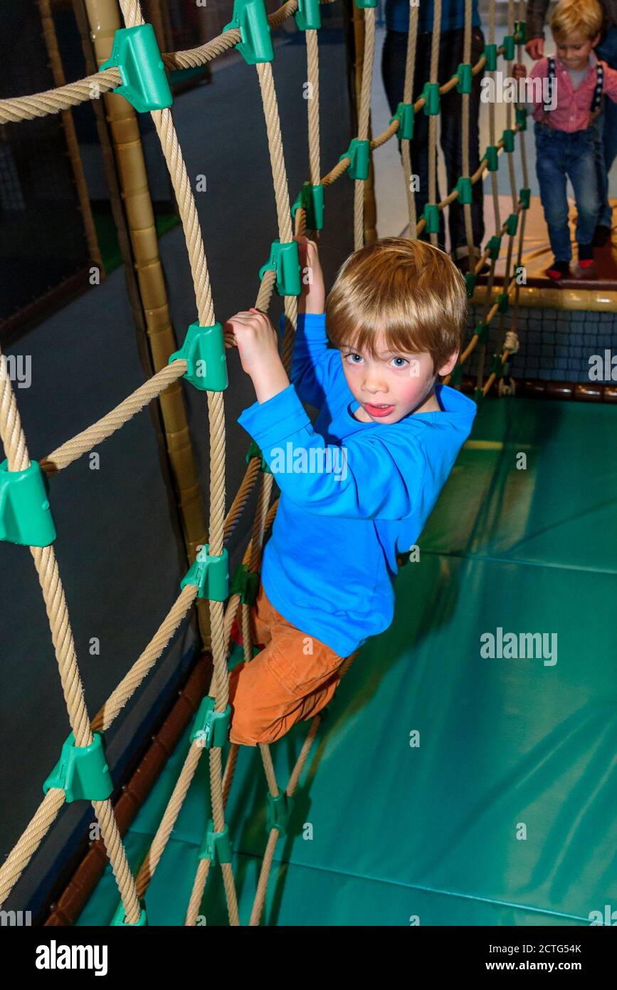Funny afternoon at indoor playground Stock Photo - Alamy
