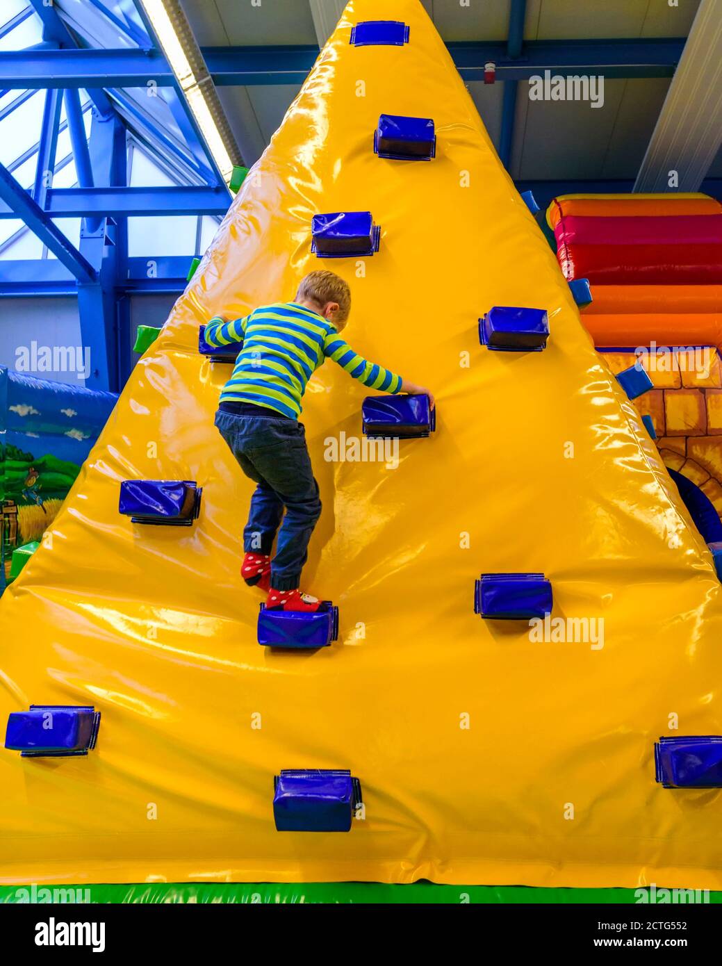 Funny afternoon at indoor playground Stock Photo - Alamy