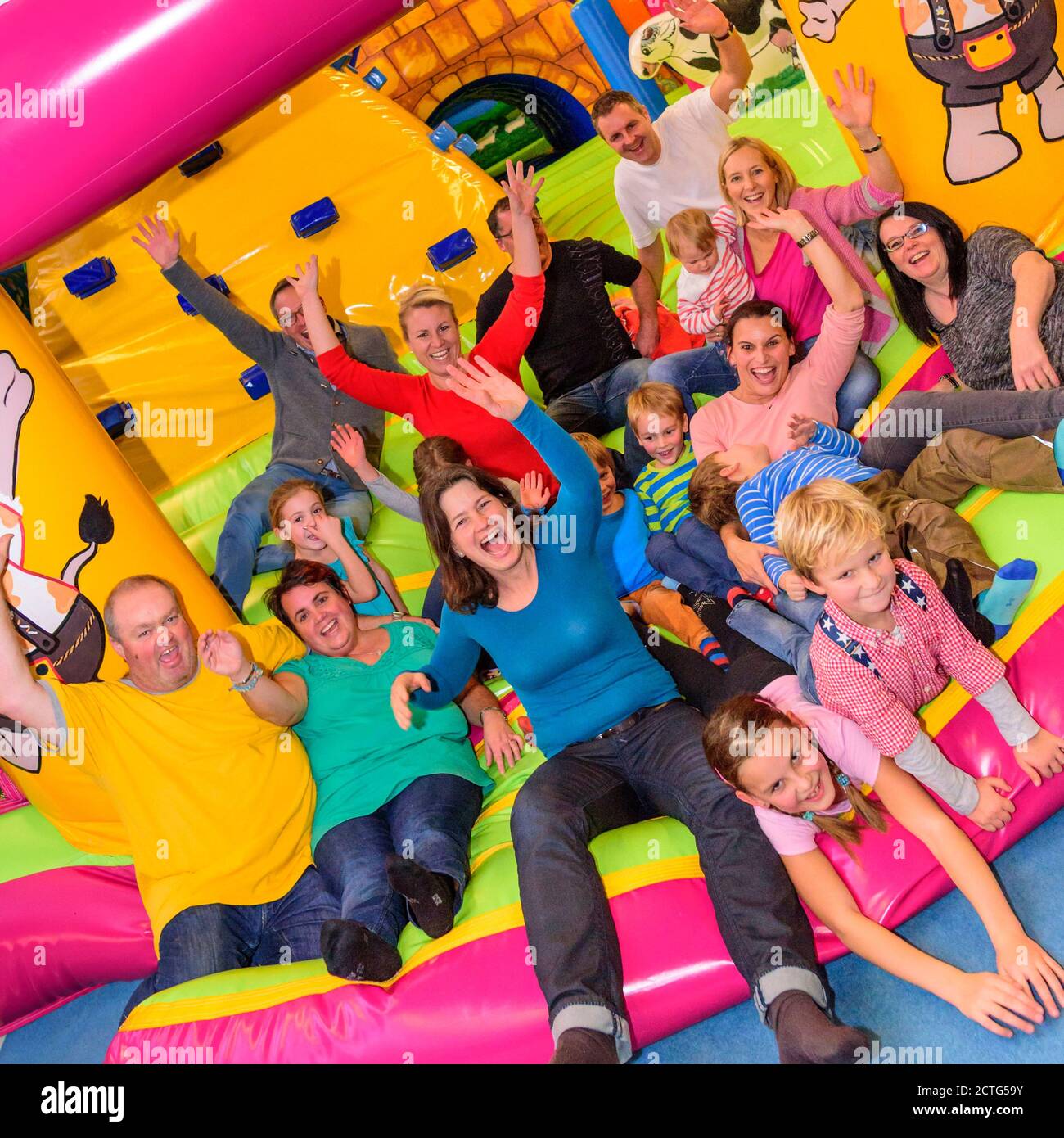 Funny afternoon at indoor playground Stock Photo - Alamy