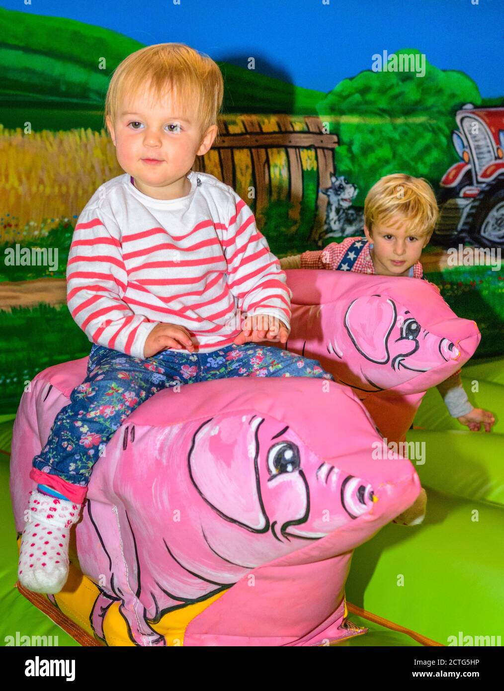 Funny afternoon at indoor playground Stock Photo - Alamy