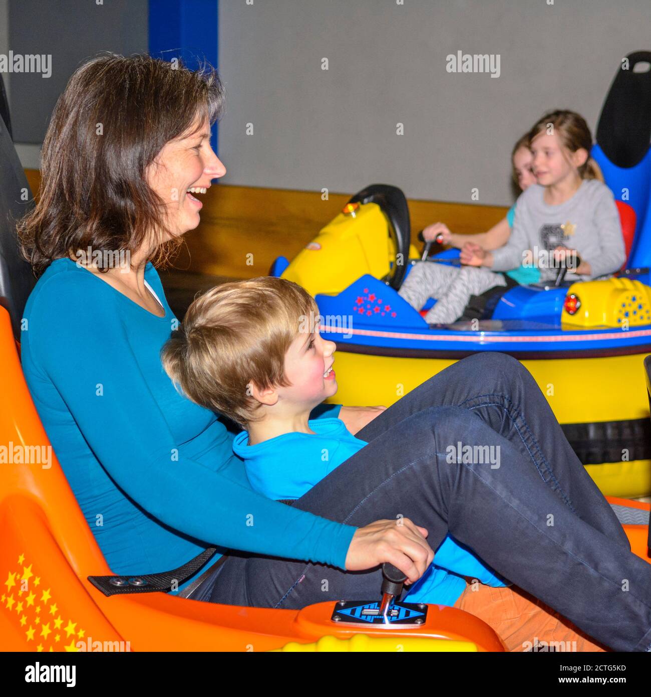 Funny afternoon at indoor playground Stock Photo - Alamy