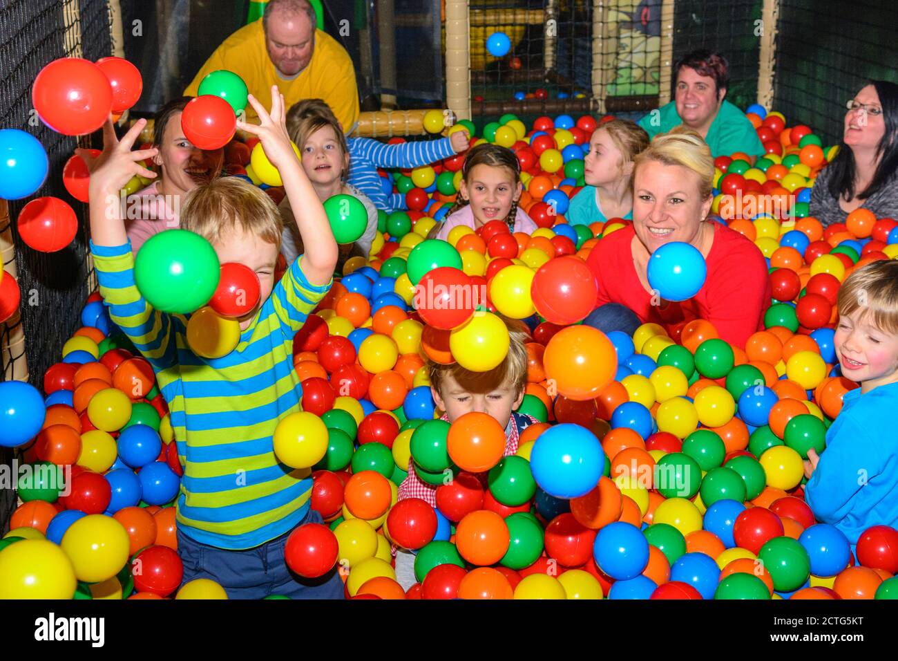 Funny afternoon at indoor playground Stock Photo - Alamy