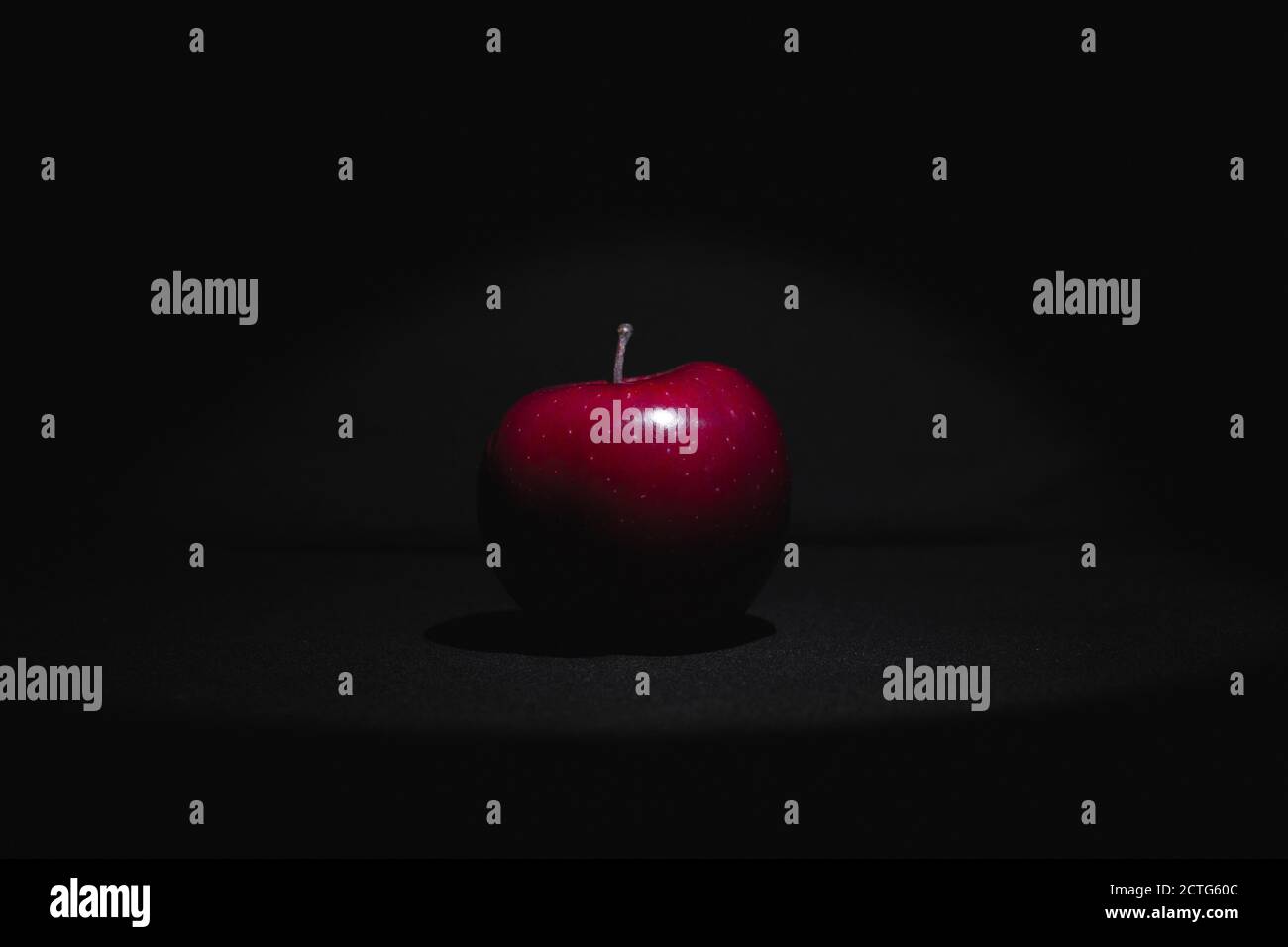 Apple fruit, abstract shadow, black background, red apple Stock Photo ...